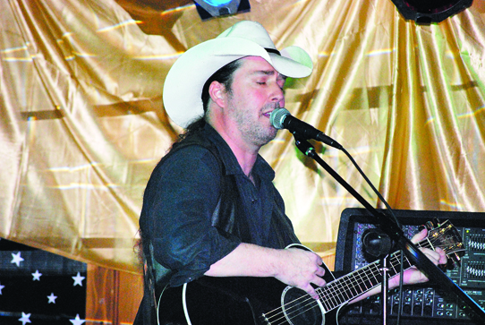 Peninsula troubadour's song chosen for film | Peninsula Daily News