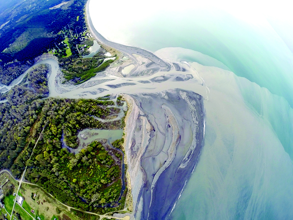 New beaches in the making: Elwha River mouth grows as unleashed ...