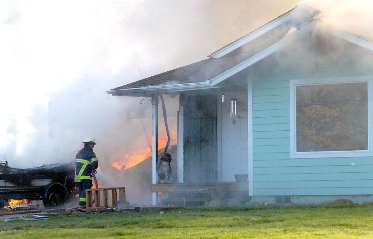 Port Angeles fire crews knock down blaze that endangered two homes ...