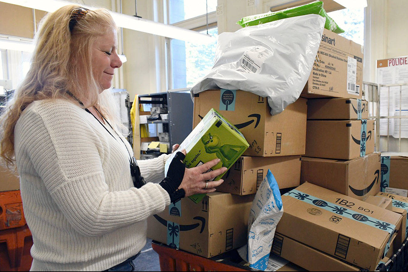 New postmaster tells of letters, packages and the uniqueness of Port ...