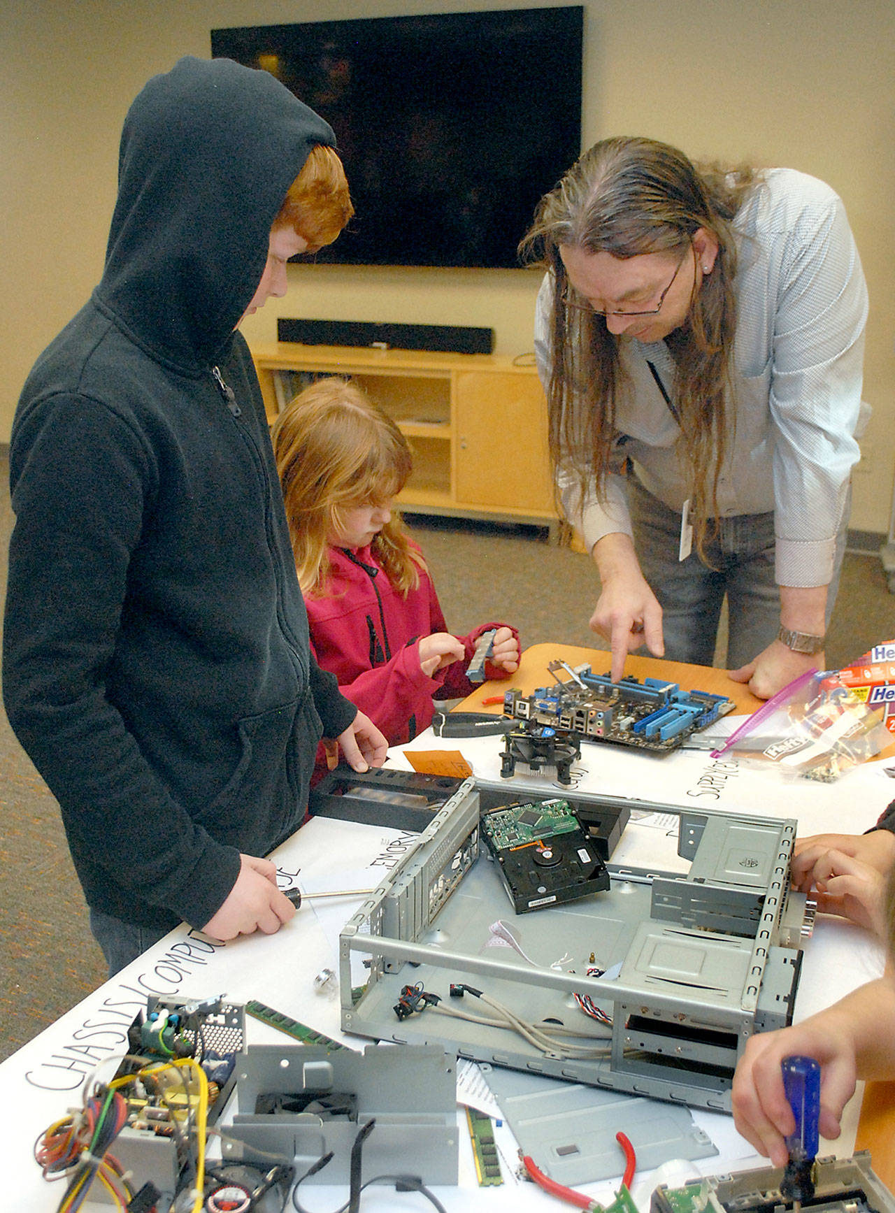 Children crack open computers at Port Angeles Library teardown event ...