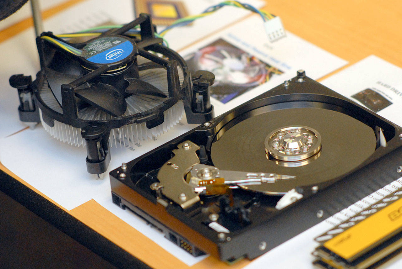 Children crack open computers at Port Angeles Library teardown event ...