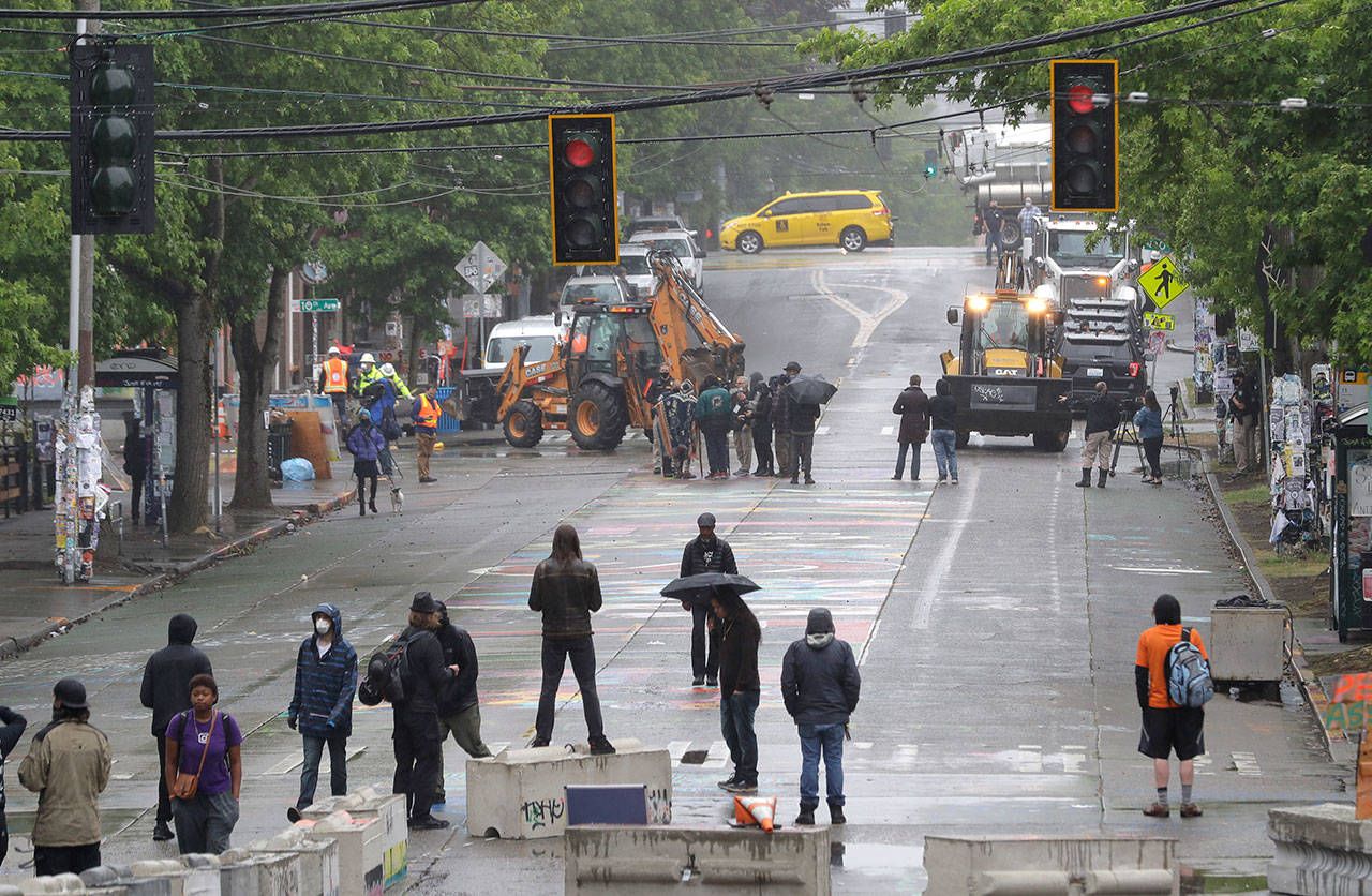City removes some barriers from Seattle protest zone | Peninsula Daily News