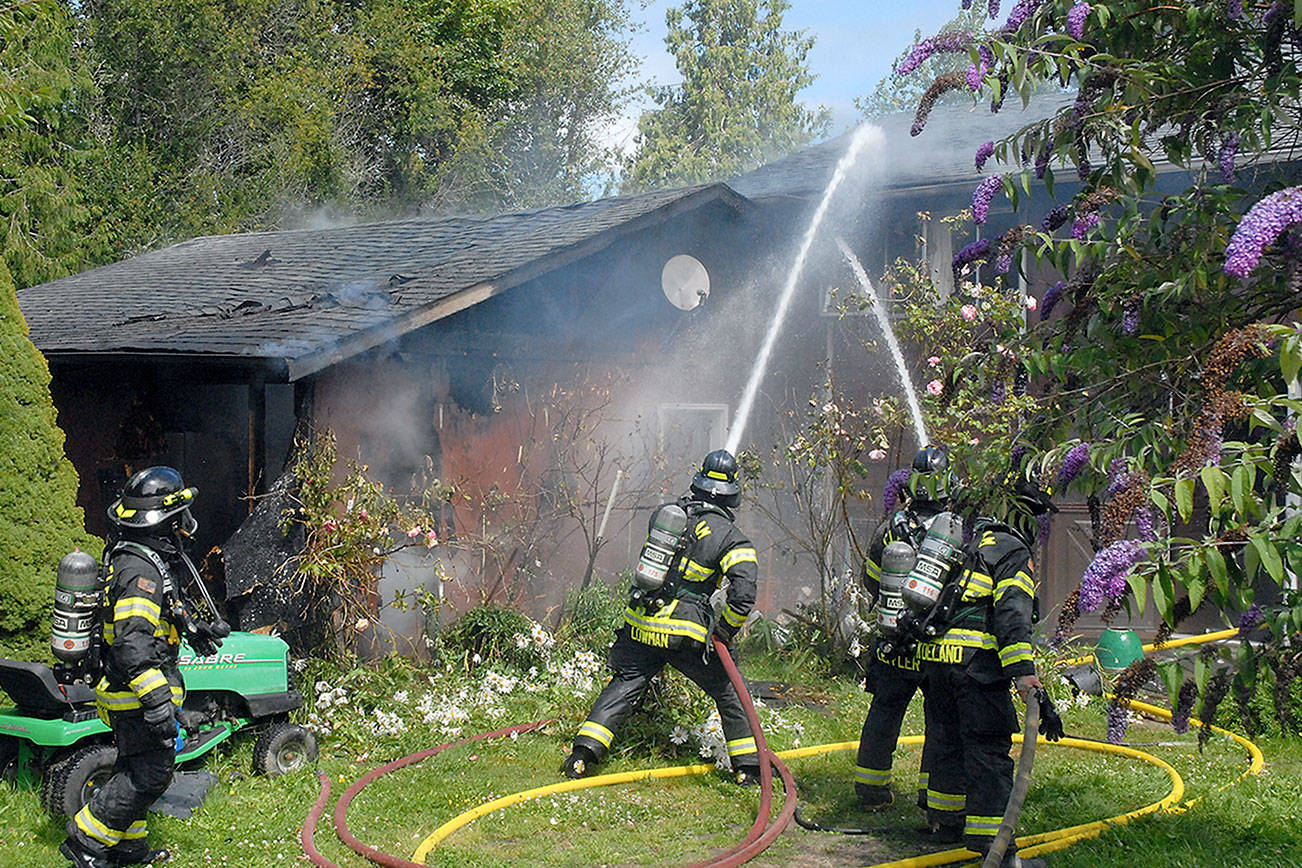 Garage fire extinguished | Peninsula Daily News