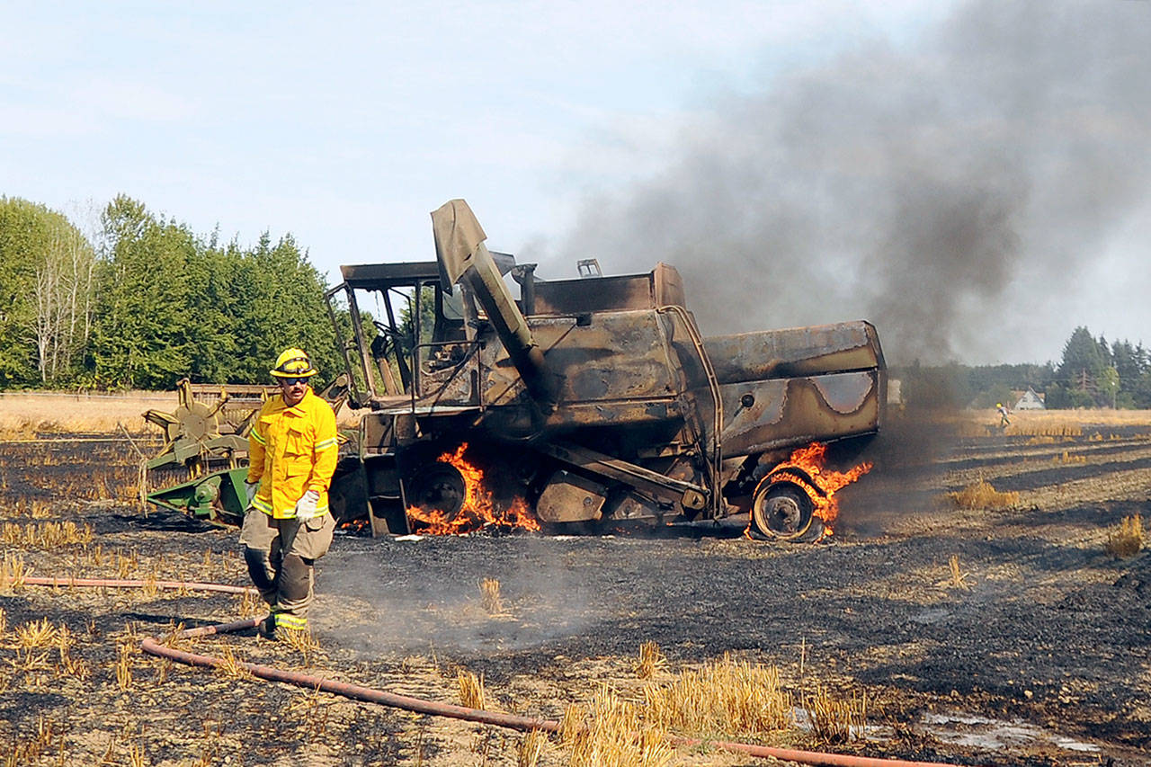 Farm equipment catches fire | Peninsula Daily News
