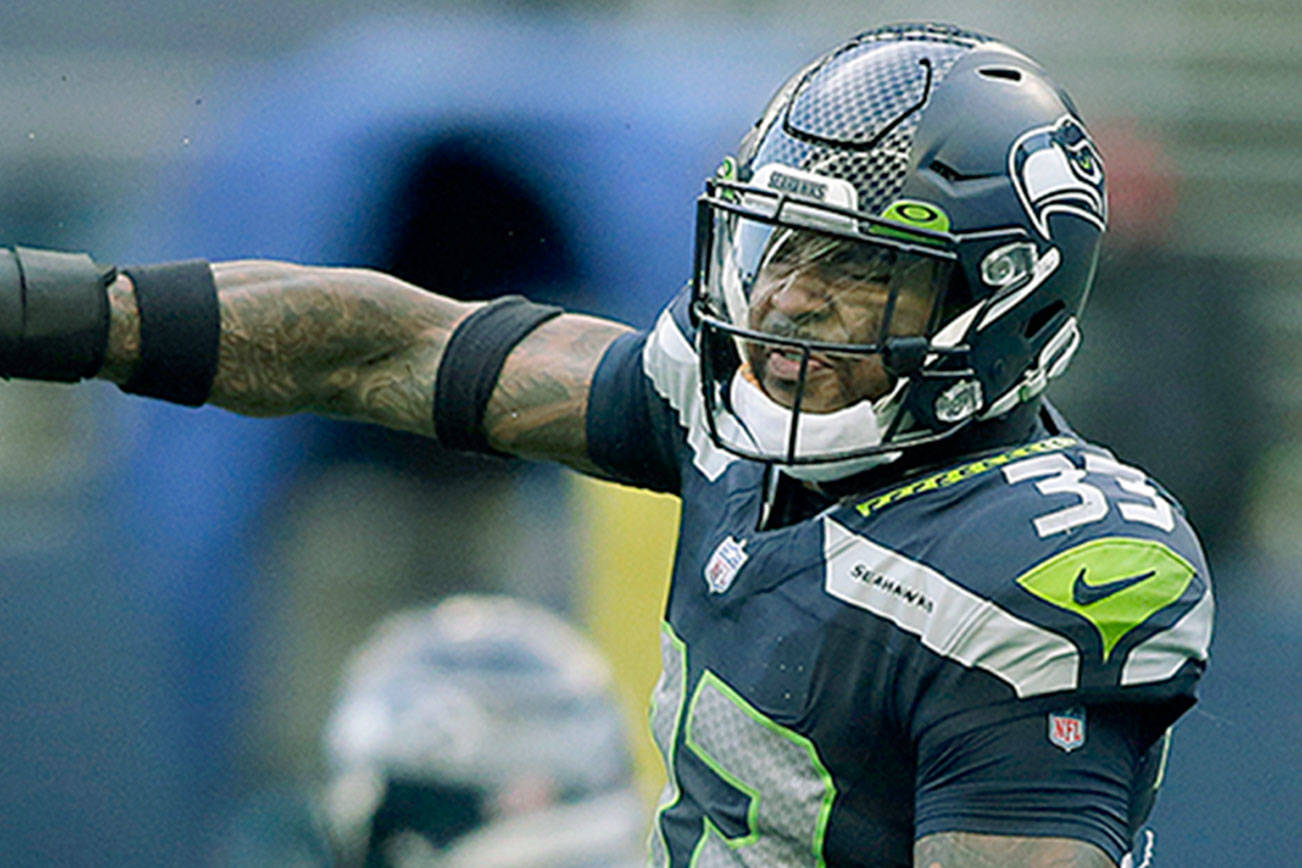 SEAHAWKS: Adams, Dunlap find the playoffs in first seasons with Seattle ...