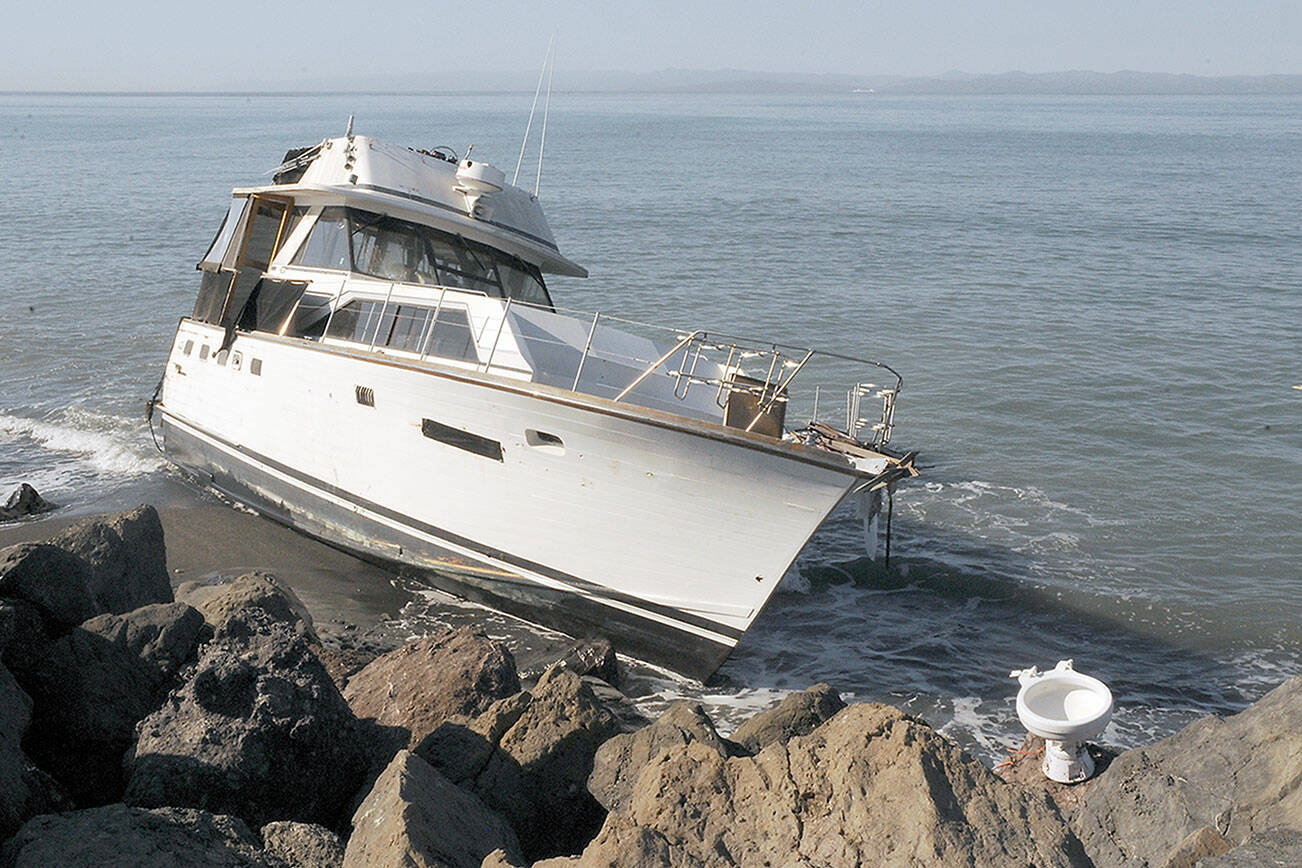 Boat remains on the rocks | Peninsula Daily News