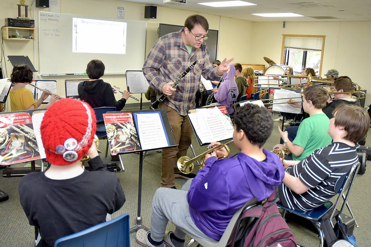 Double-duty teaching keeps band program alive | Peninsula Daily News
