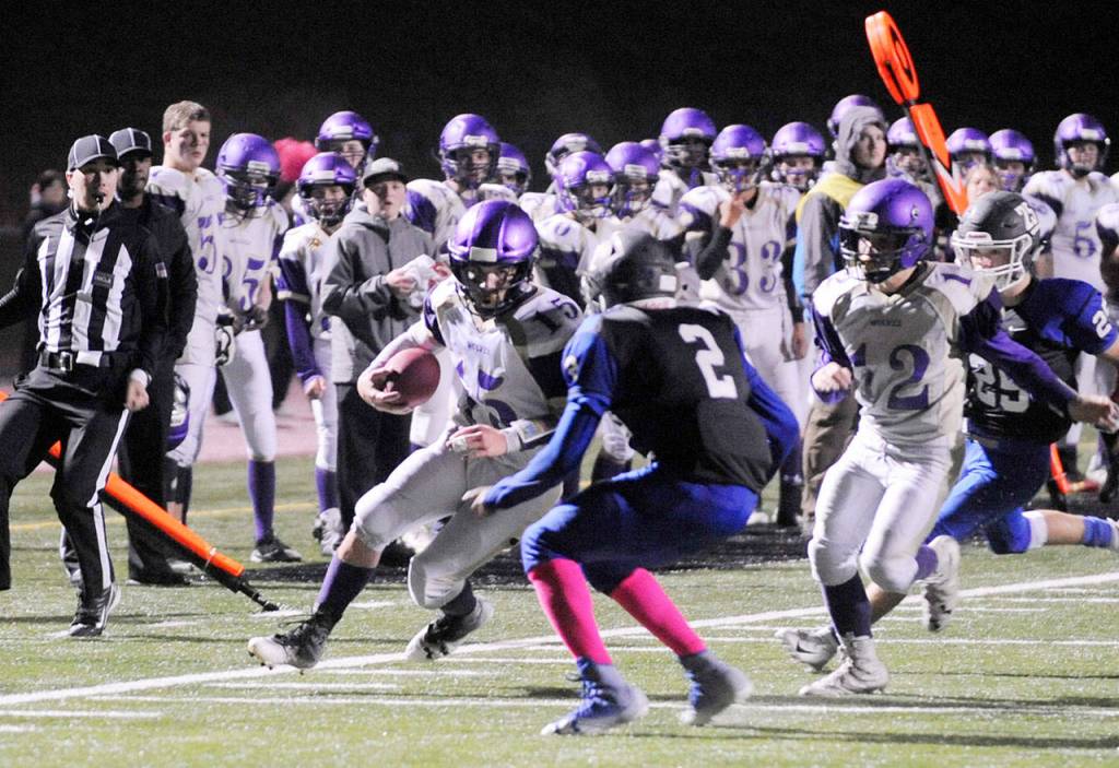 DISTRICT FOOTBALL: Sequim sophomore Taig Wiker adds balance to Wolves ...